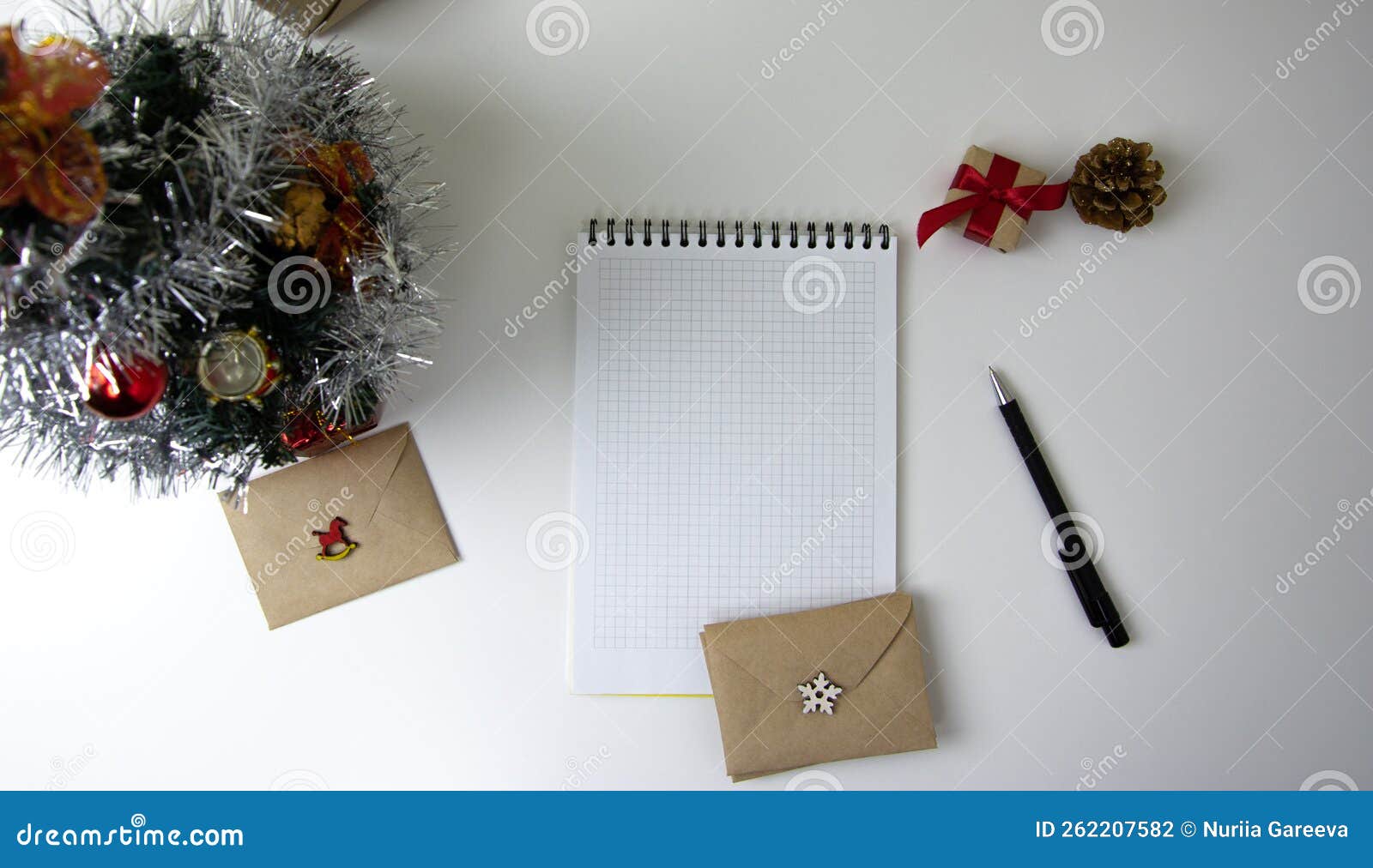 2023 Notepad, Envelope, Chistmas Tree and Pen on Office Table. To-do ...