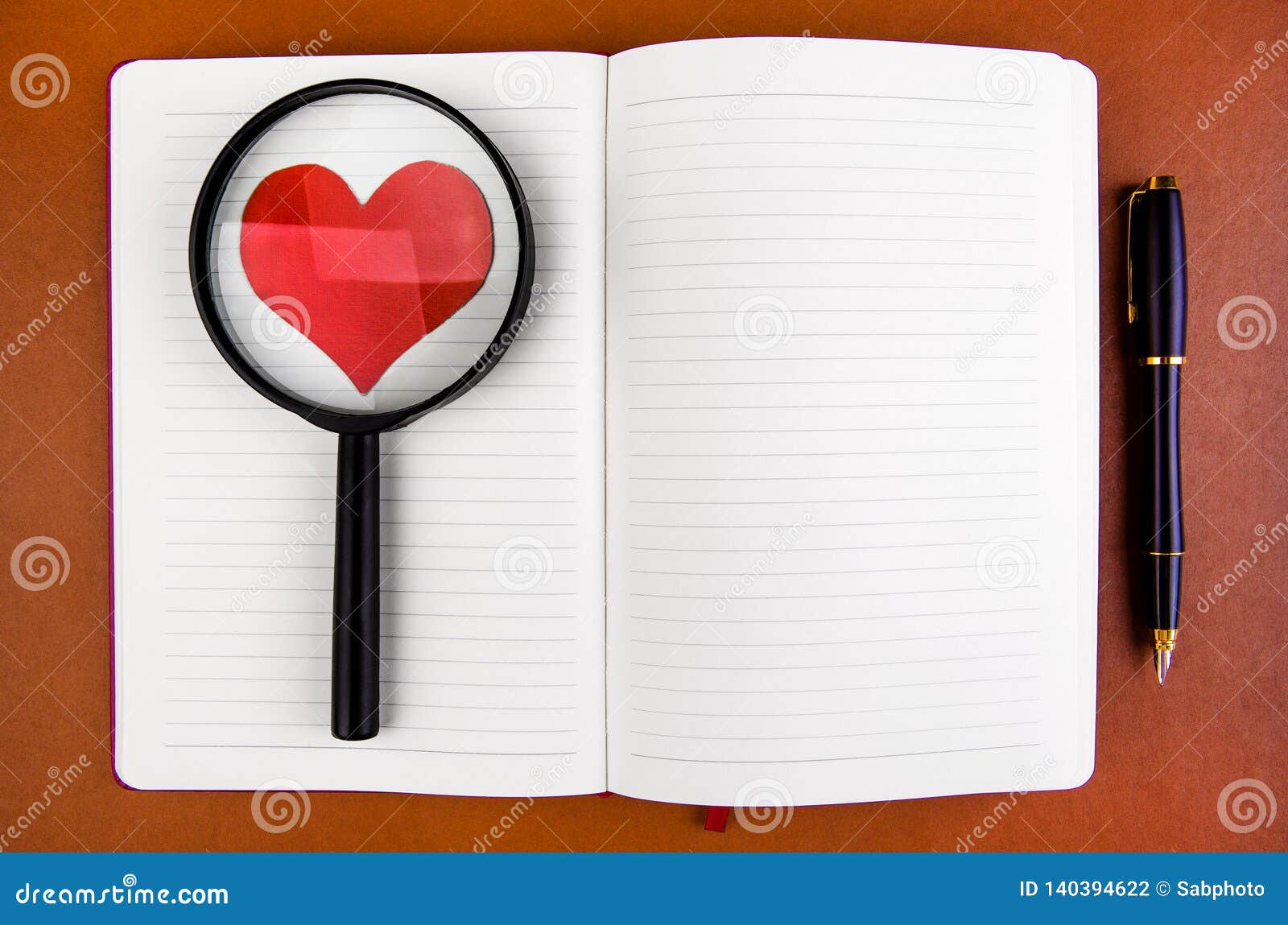 Notepad with a Heart Shape stock photo. Image of analyzing - 140394622