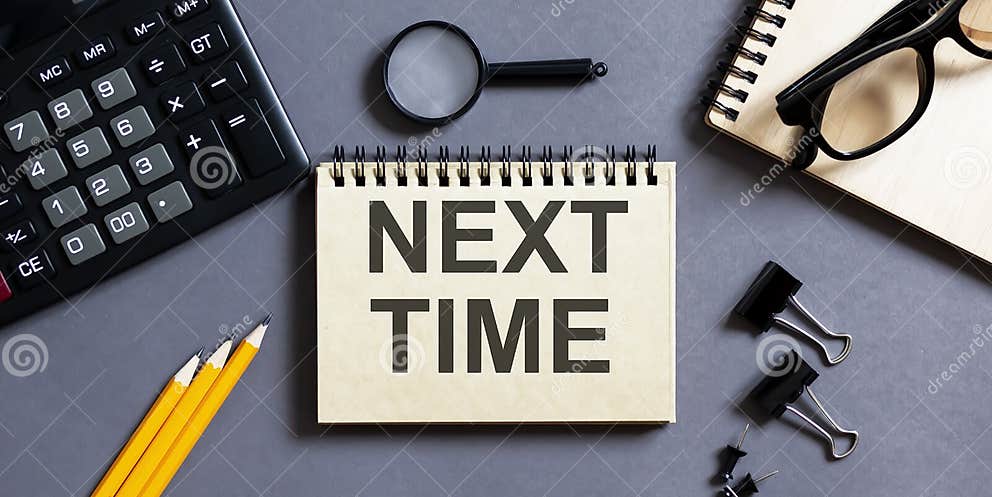 Notepad with Inscriptions NEXT TIME on a Grey Background with Office ...