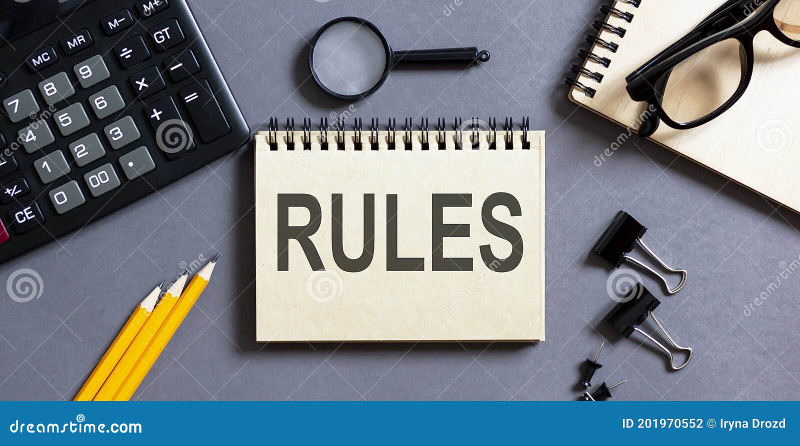 Notepad with Inscriptions RULES on a Grey Background with Office Tools ...