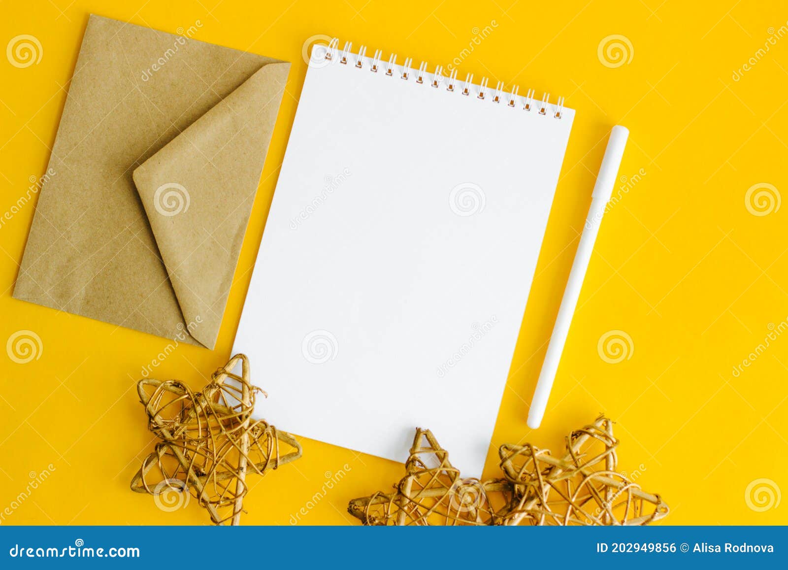 The Notepad And Letter Envelope Are On A Bright Yellow Background Stock ...