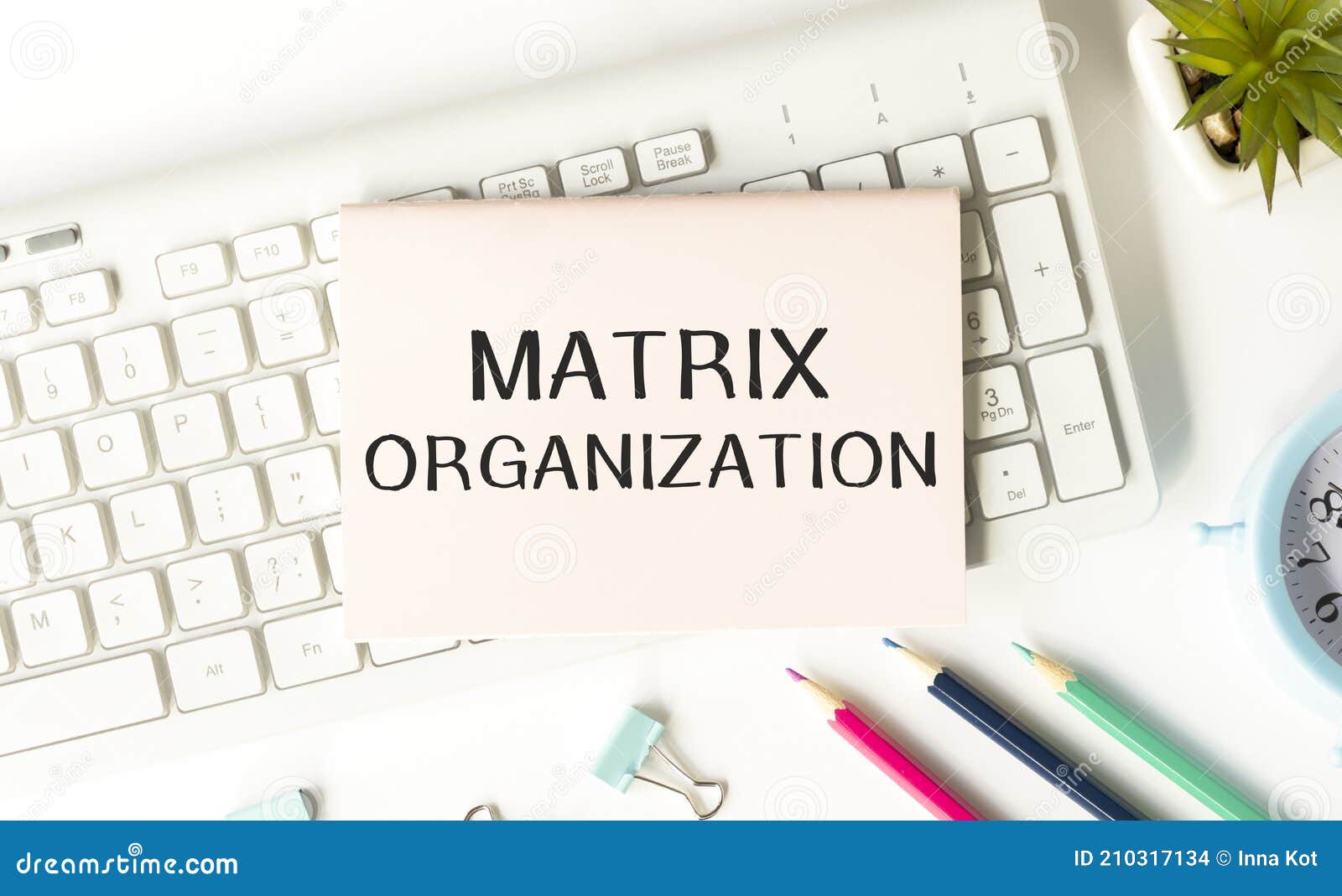 Notepad with Matrix Organization Text on Keyboard Stock Photo - Image ...