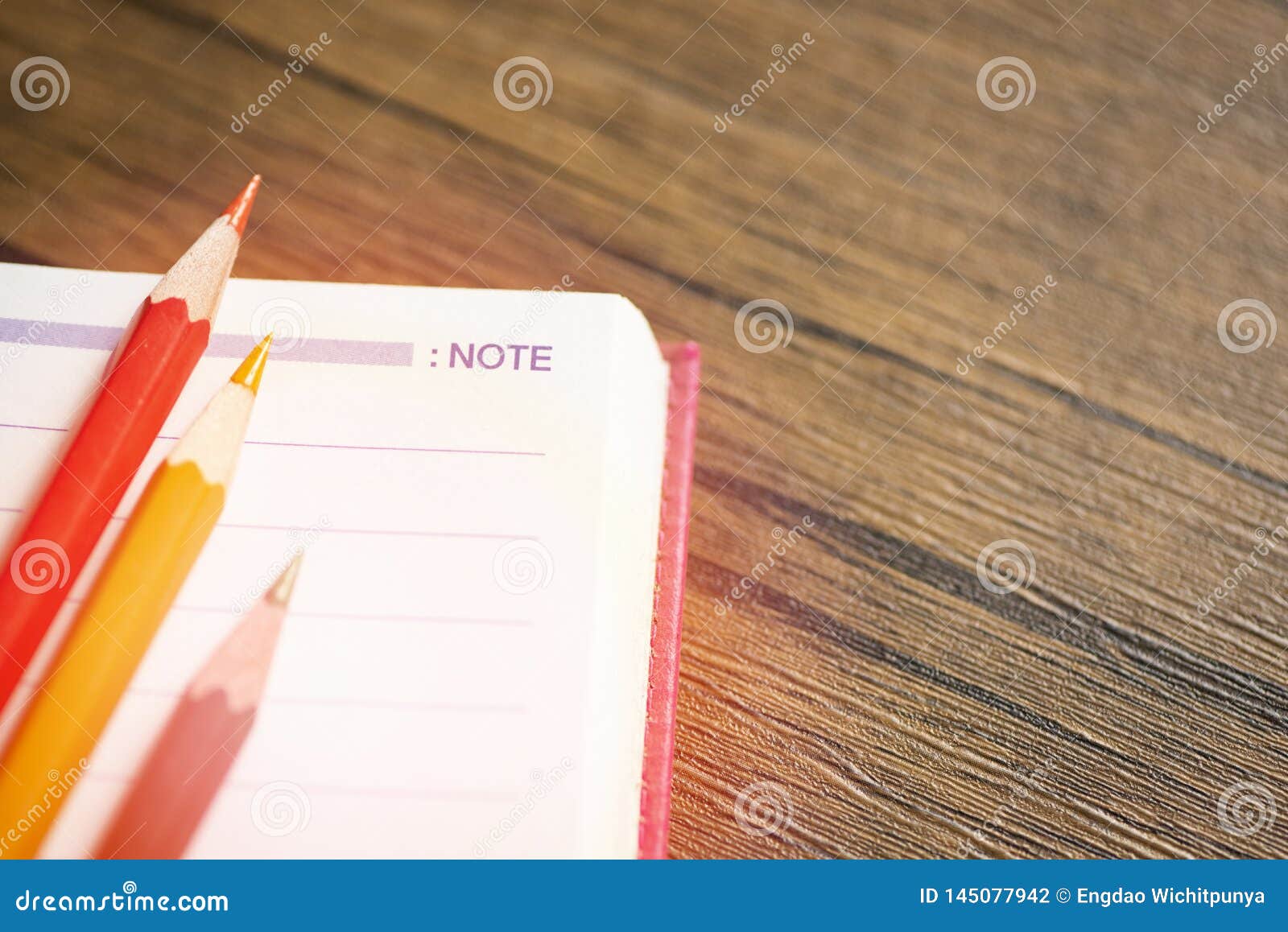 Notepad or Notebook Paper with Color Pencil on the Table Education and ...