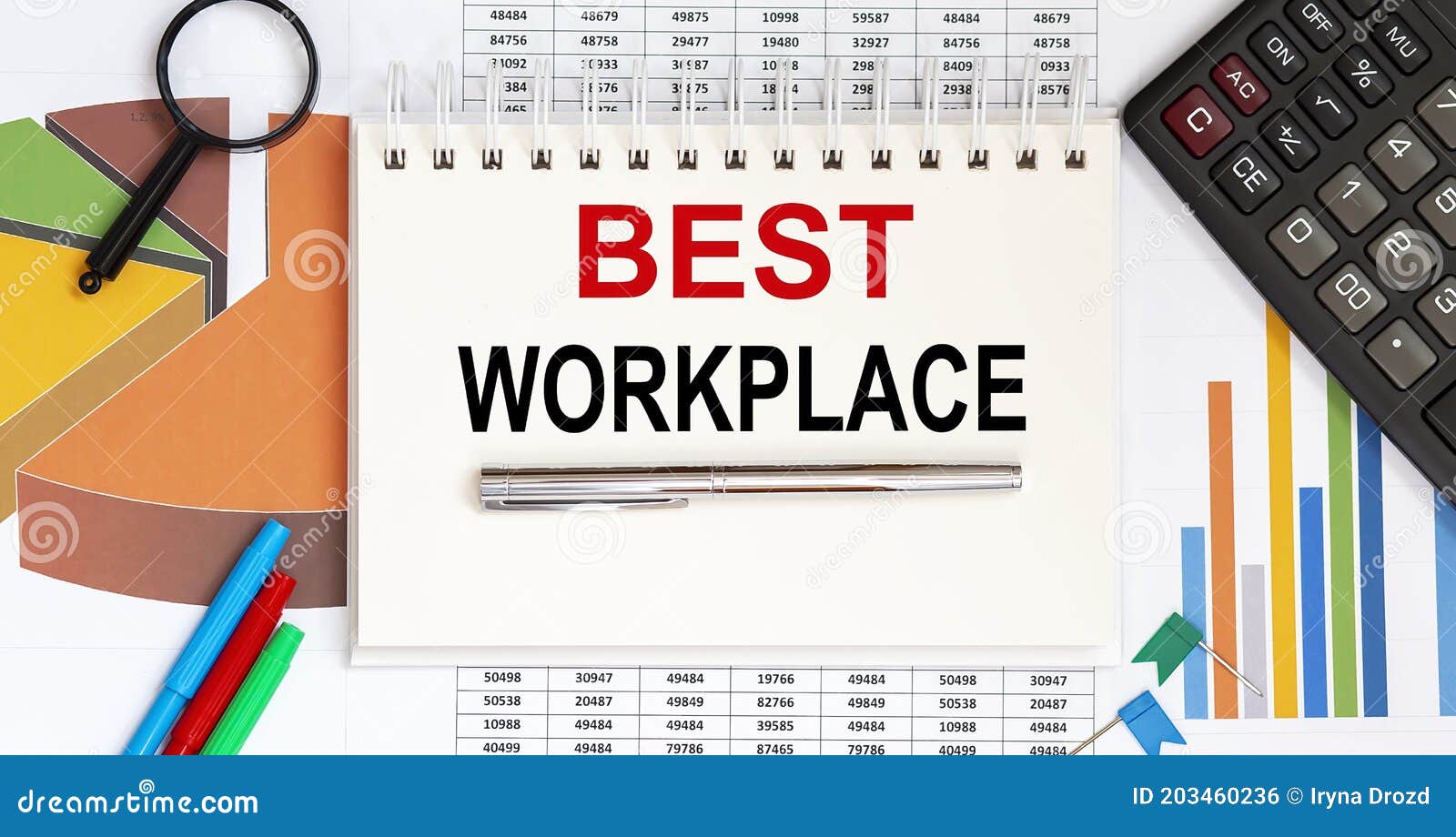 Notepad on the Office Desk with Charts with Text BEST WORKPLACE Stock ...