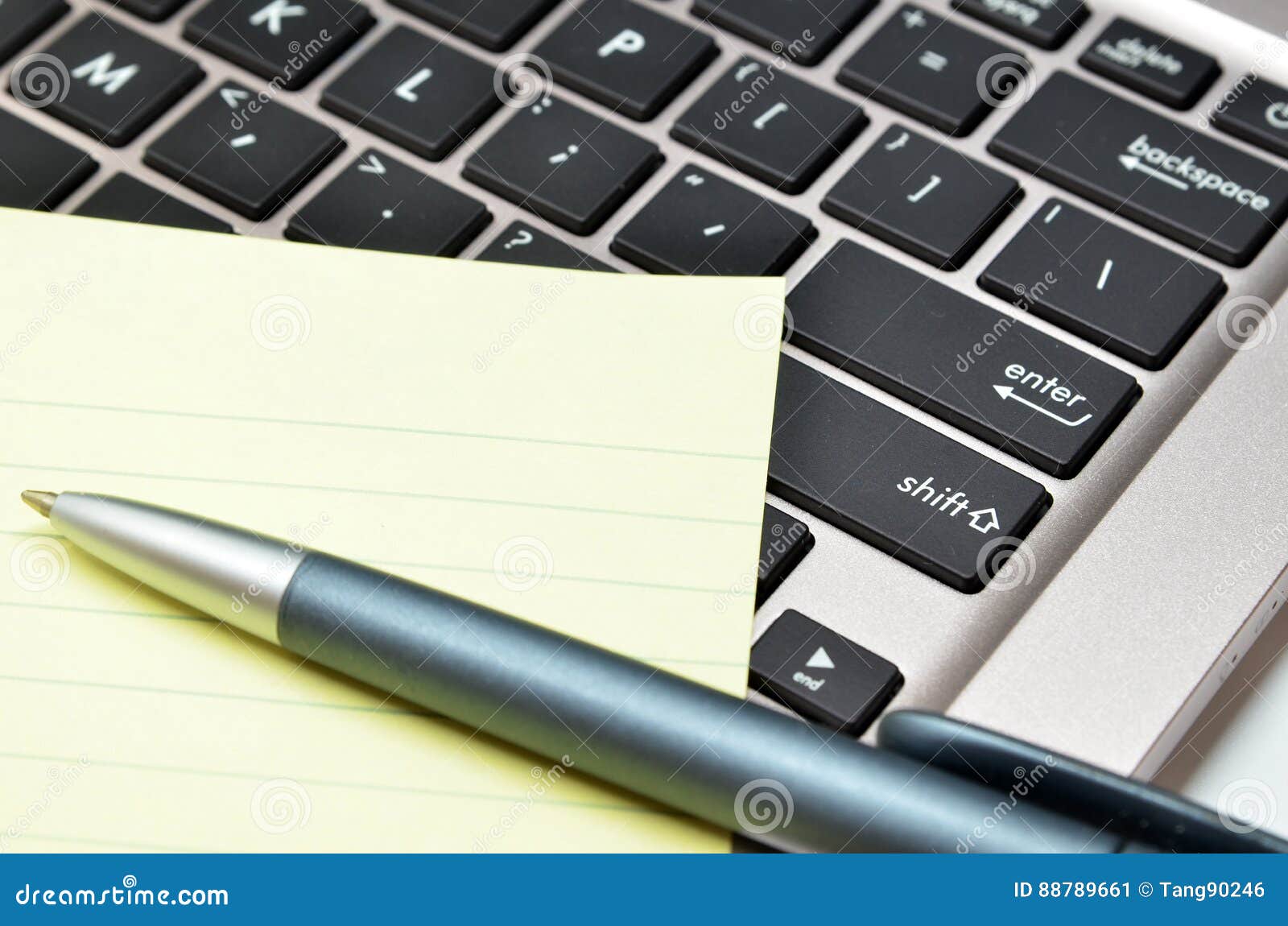 Notepad and Pen on Black Keyboard Stock Image - Image of stationary ...