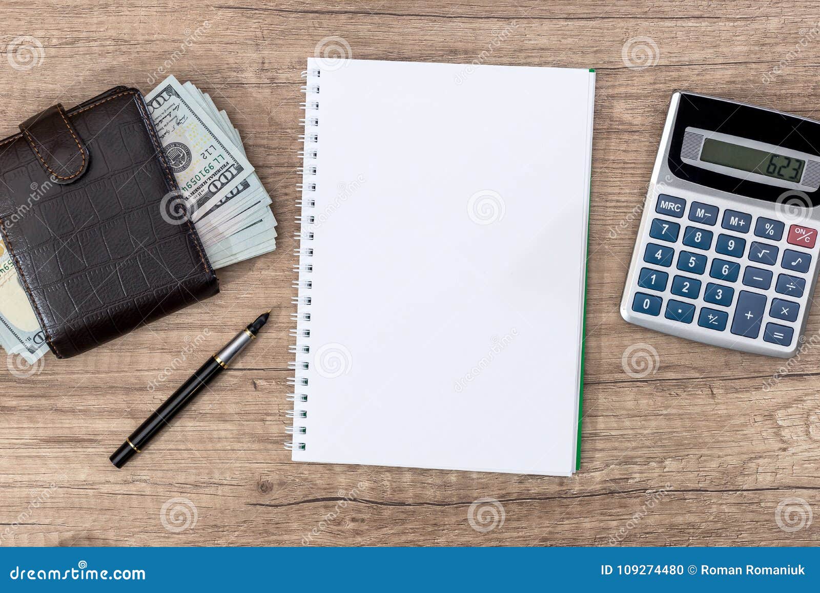 Notepad with Pen, Calculator, Dollar Bills Stock Photo - Image of ...