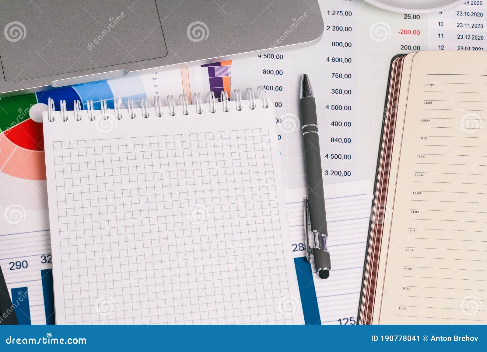 Notepad with Pen, Computer, Charts and Tables. Employee`s Office Desk ...