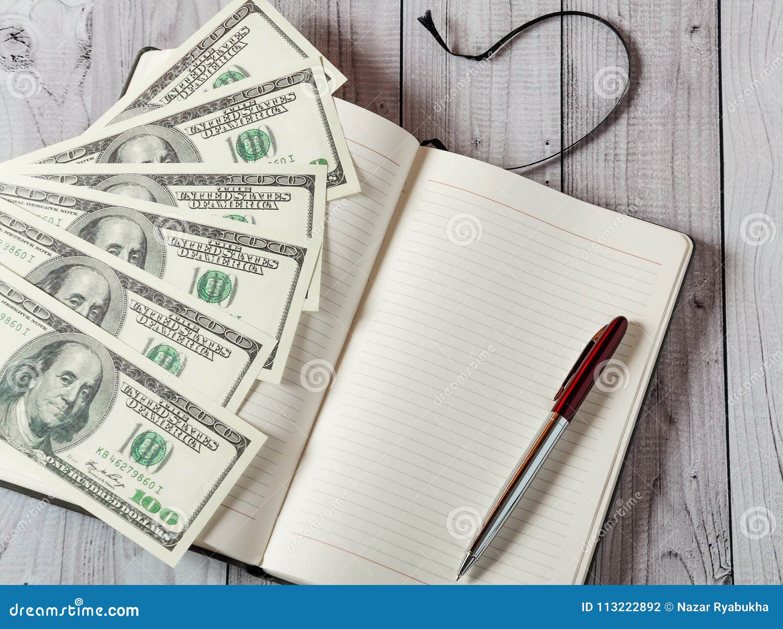 Notepad, Pen and Money on a Light Wooden Background Stock Photo - Image ...