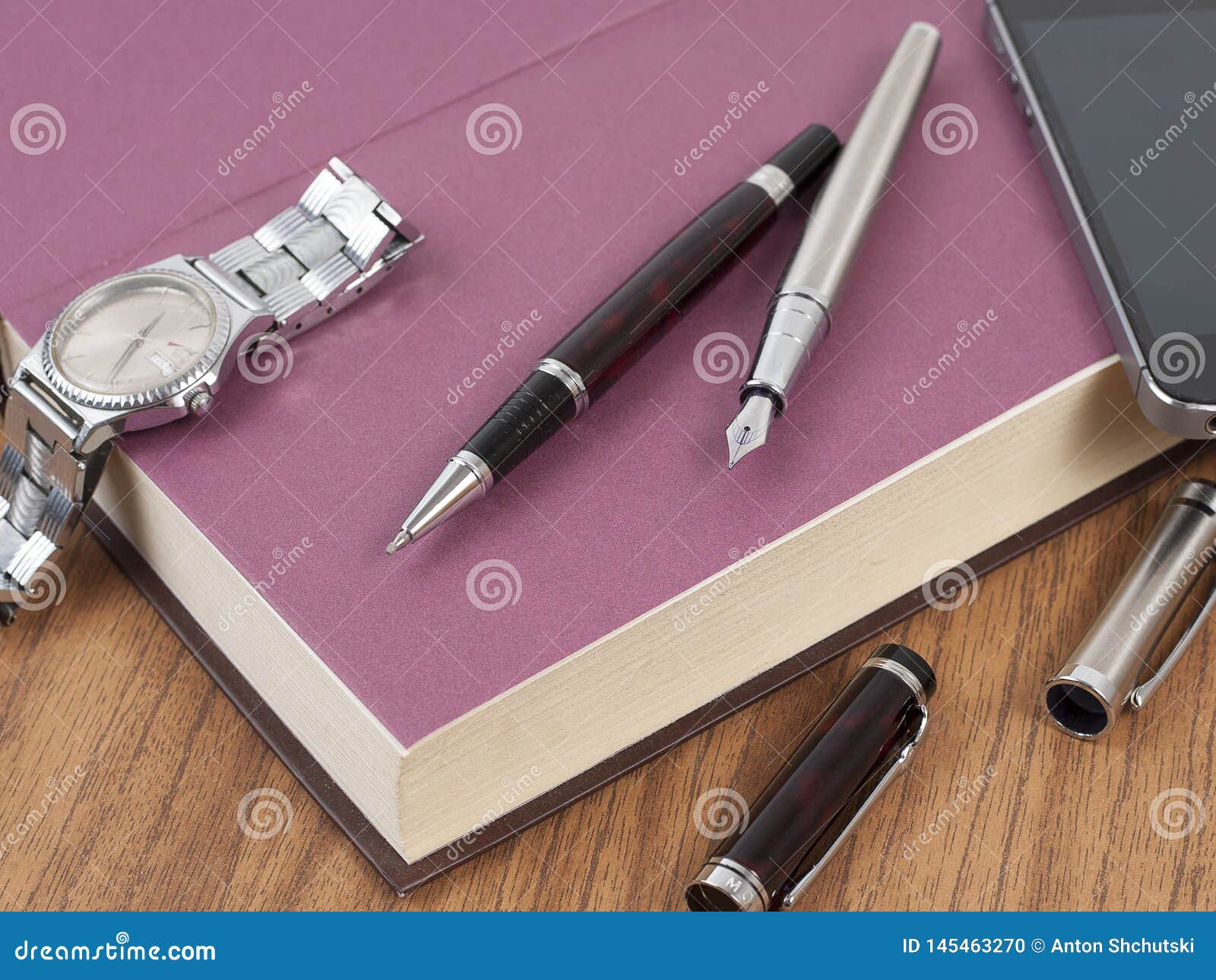 Notepad, Pen and Watches on the Wood Desk Stock Photo - Image of ...