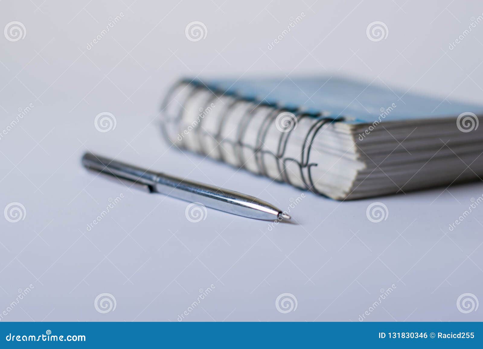 Notepad With Pen On White Background . Side View Stock Photo - Image of ...