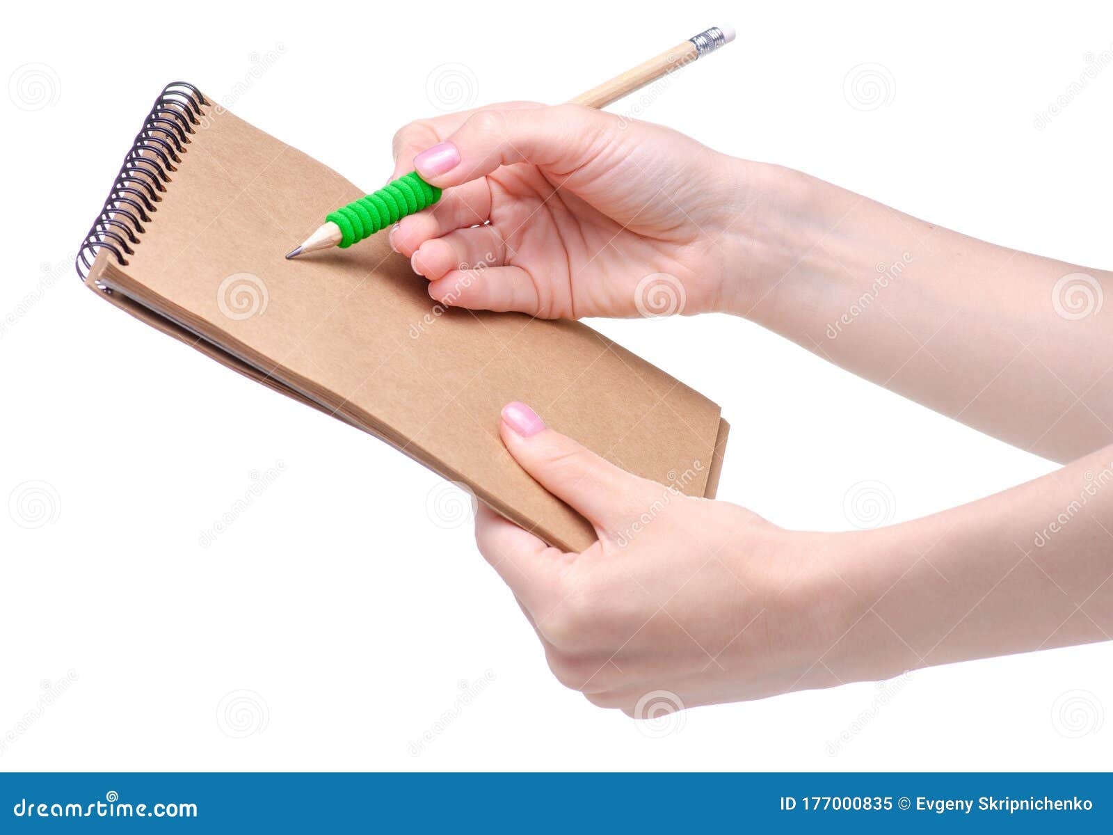Notepad and pencil in hand stock image. Image of book - 177000835