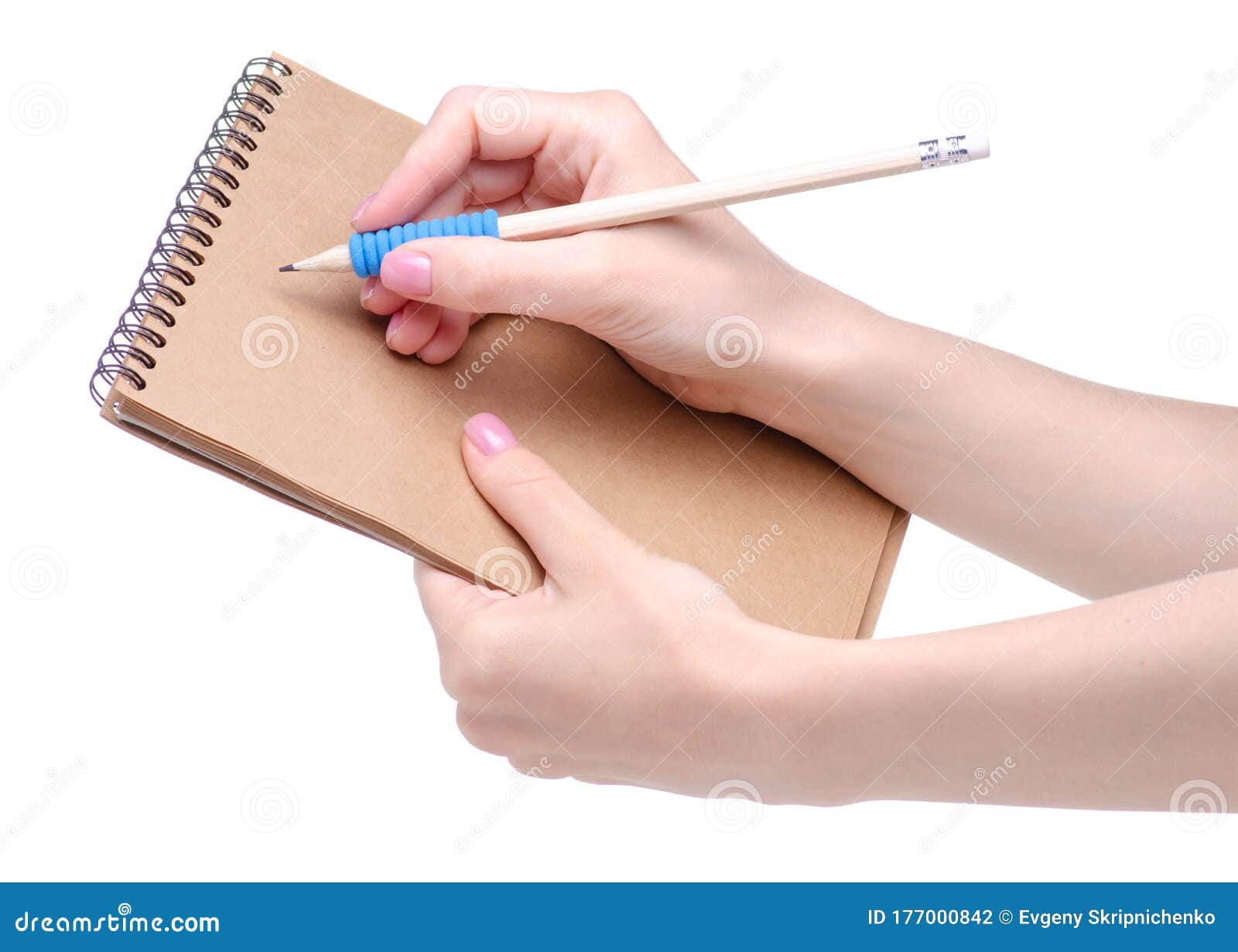 Notepad and pencil in hand stock photo. Image of graphic - 177000842