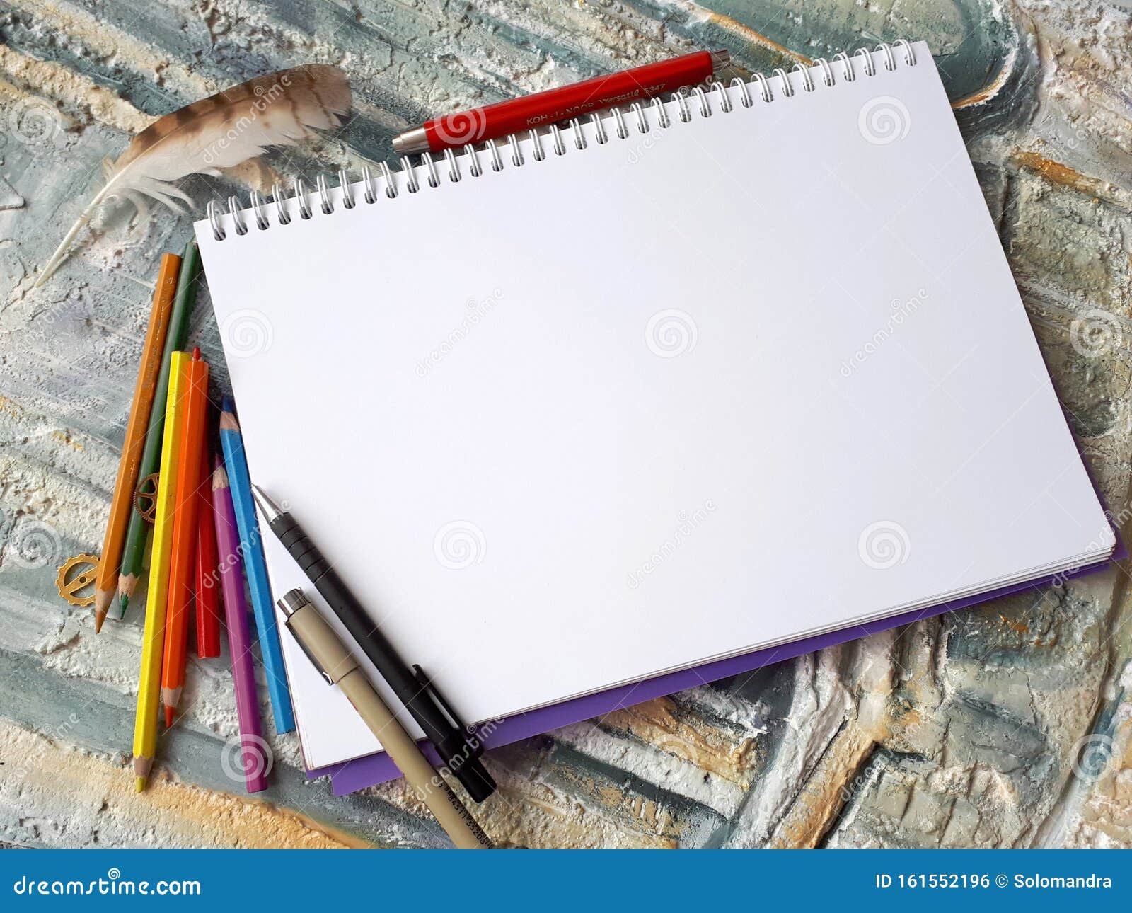 Notepad for the Sketch on a Colourful Background with a Pencils Stock ...