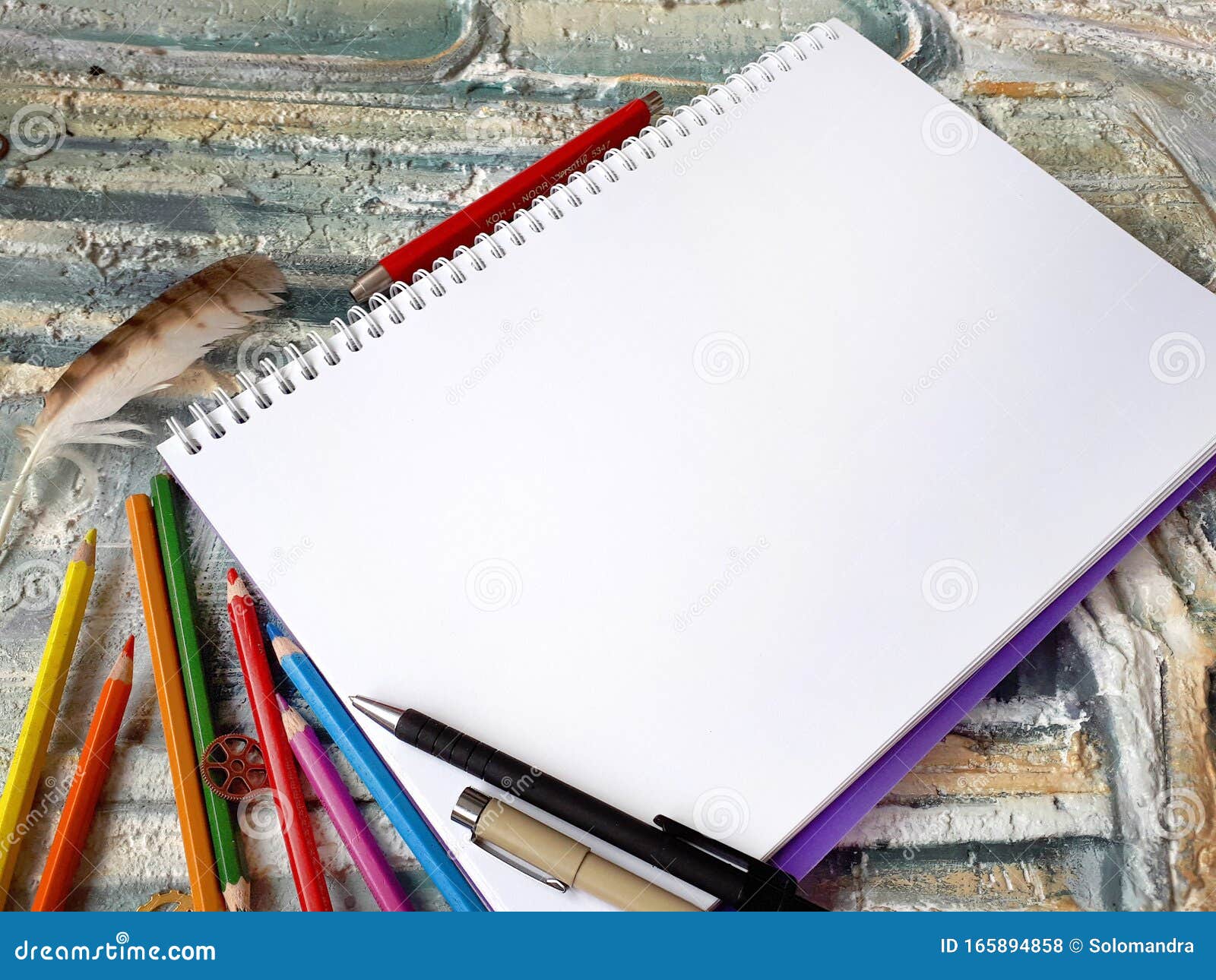 Notepad for the Sketch on a Colourful Background with a Pencils Stock ...