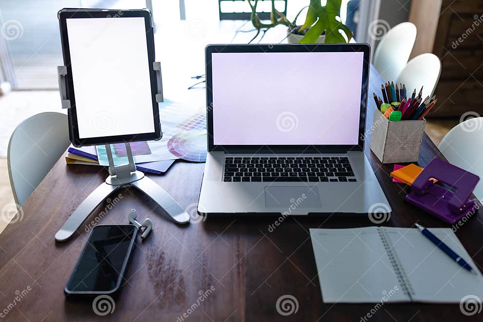 Notepad and Smartphone with Laptop and Tablet with Copy Space on ...
