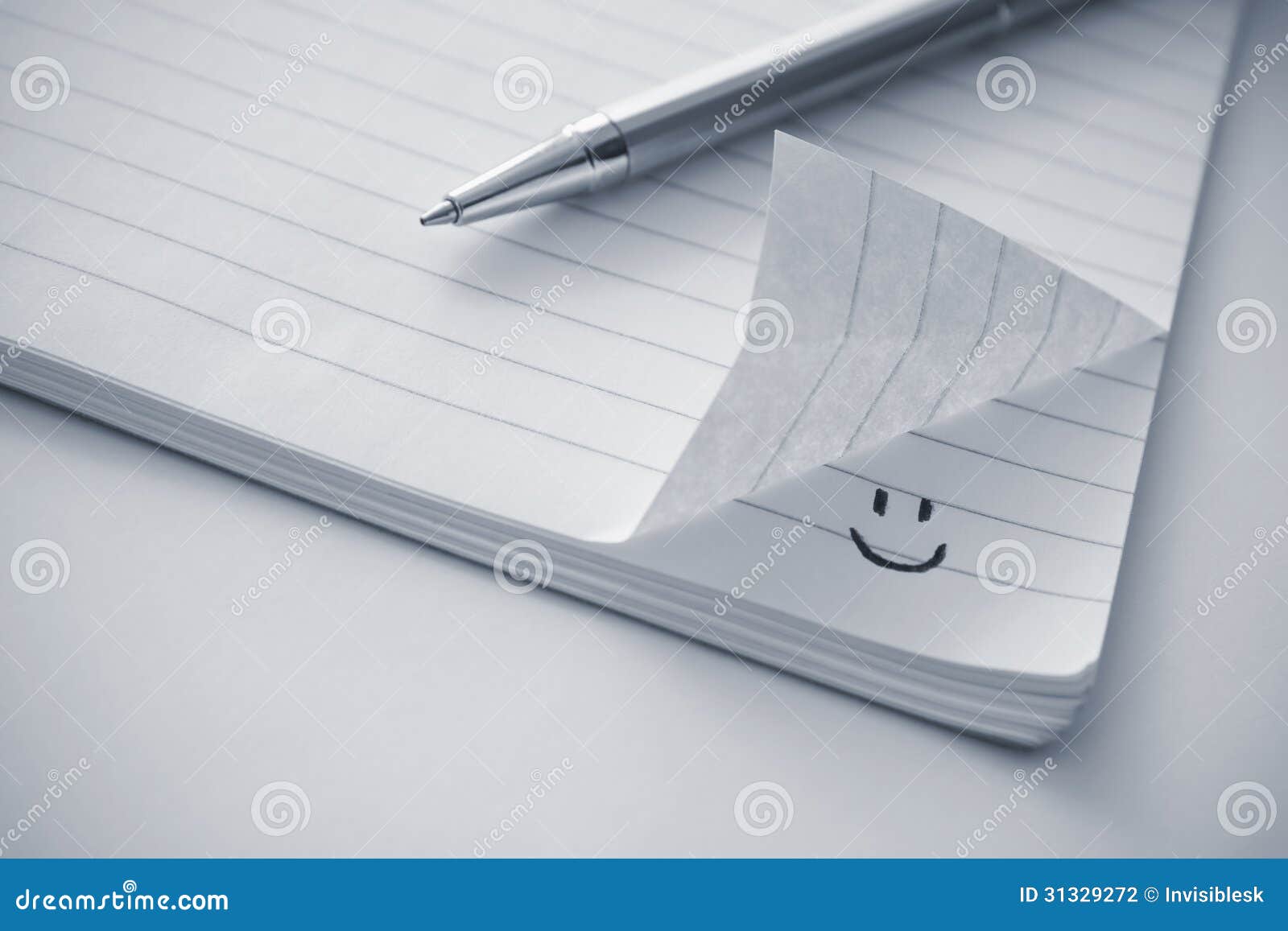 Notepad with a smiley icon stock photo. Image of notebook - 31329272