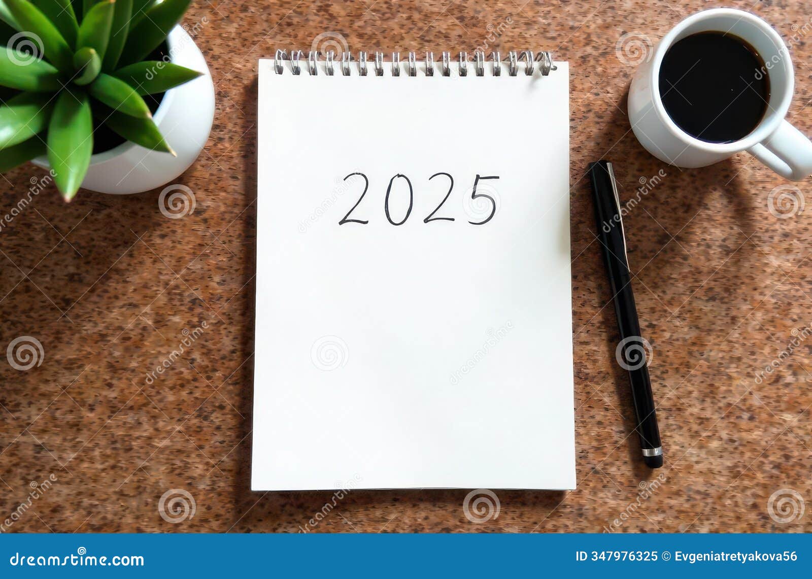 Notepad on Spring with Numbers 2025 on First Blank Page, Top View. New ...