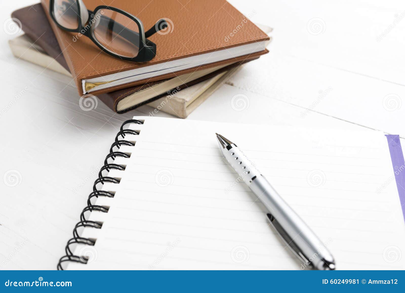 Notepad with stack of book stock image. Image of spiral - 60249981