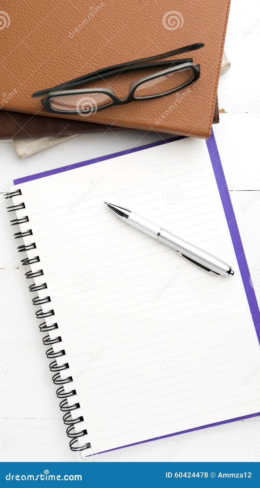 Notepad with stack of book stock photo. Image of stack - 60424478