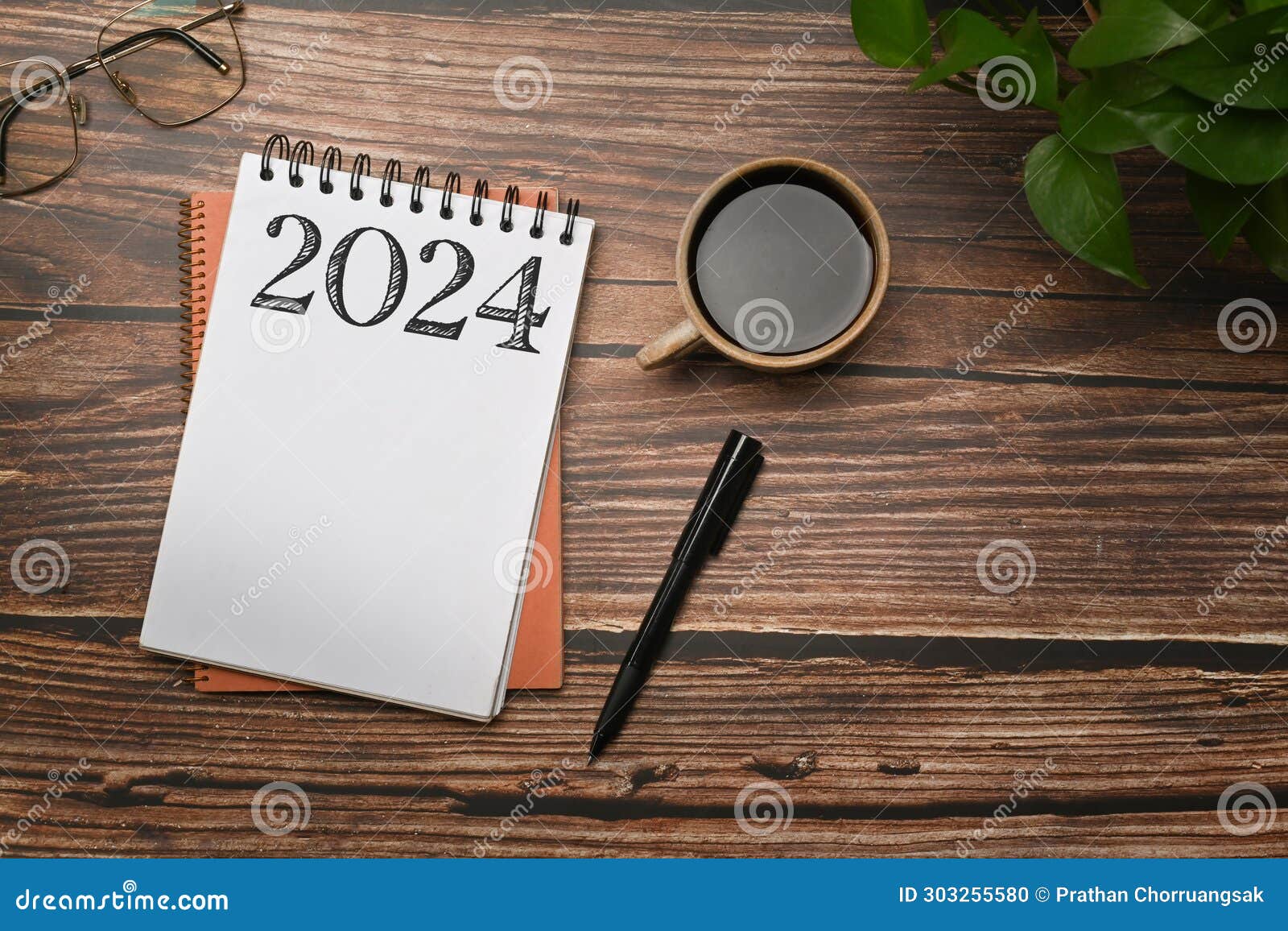 Notepad with 2024 Text To Apply New Year 2024 Resolutions. Goals ...