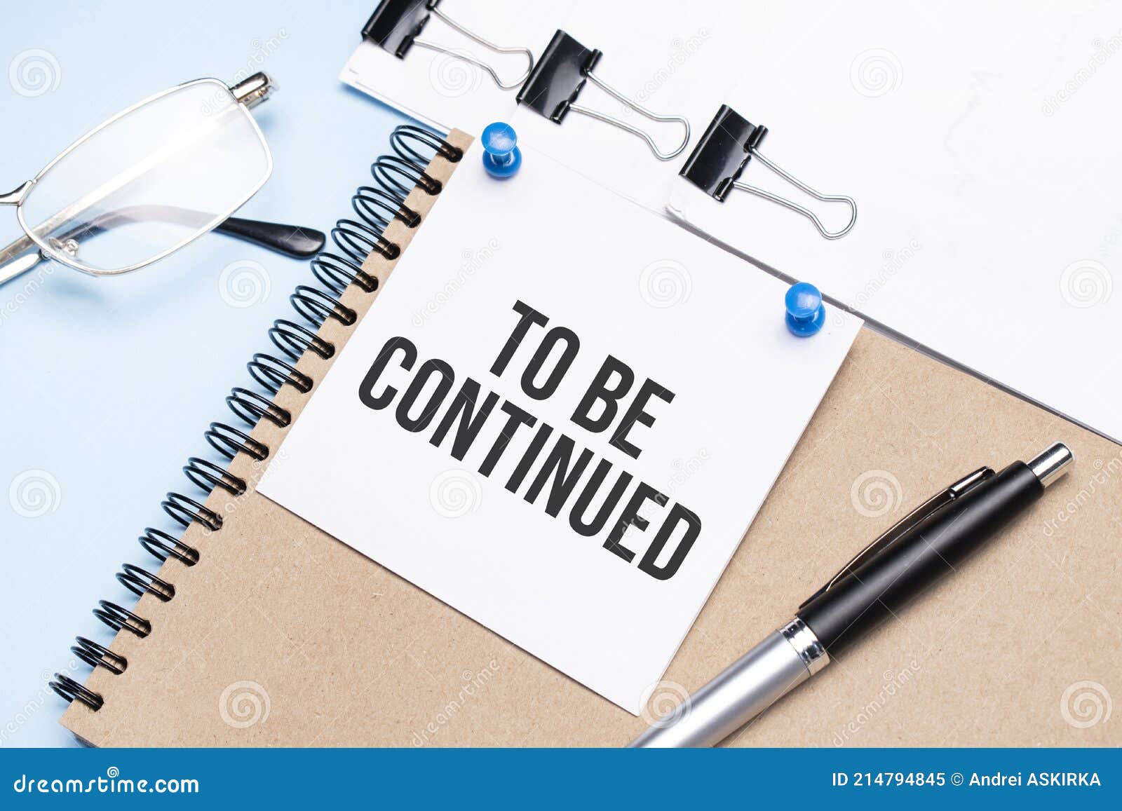 Notepad with To Be Continued Text on the Office Table with Glasses ...