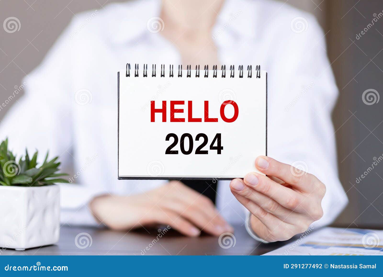 A Notepad Witn Message HELLO 2024 in a Woman S Hand Stock Photo - Image ...