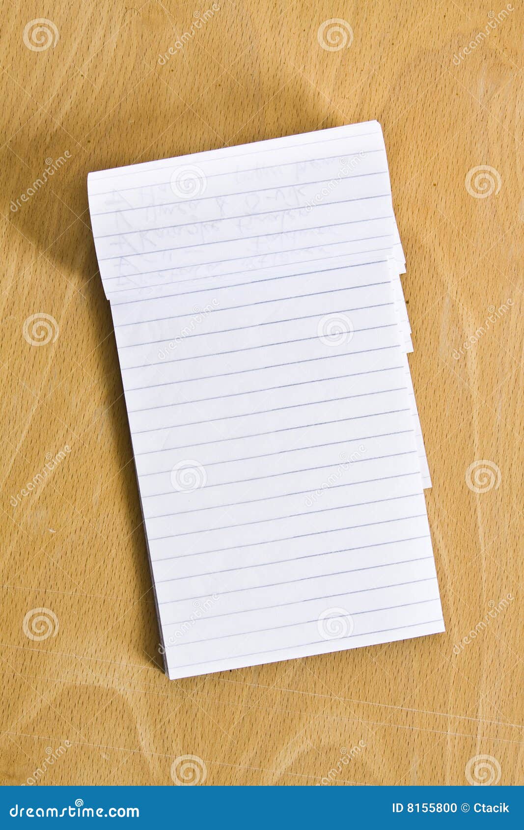Notepad on wooden table stock photo. Image of reminder - 8155800