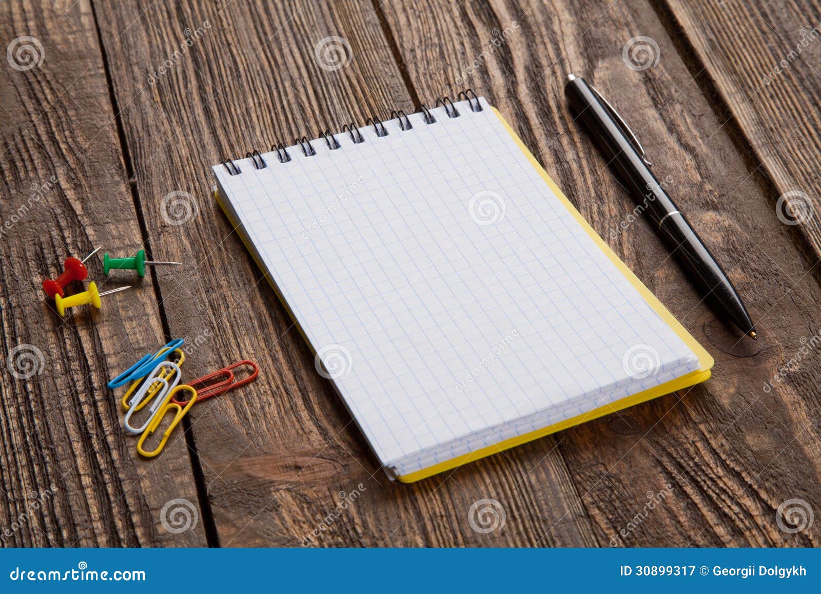Notepad on a wooden table stock image. Image of wood - 30899317