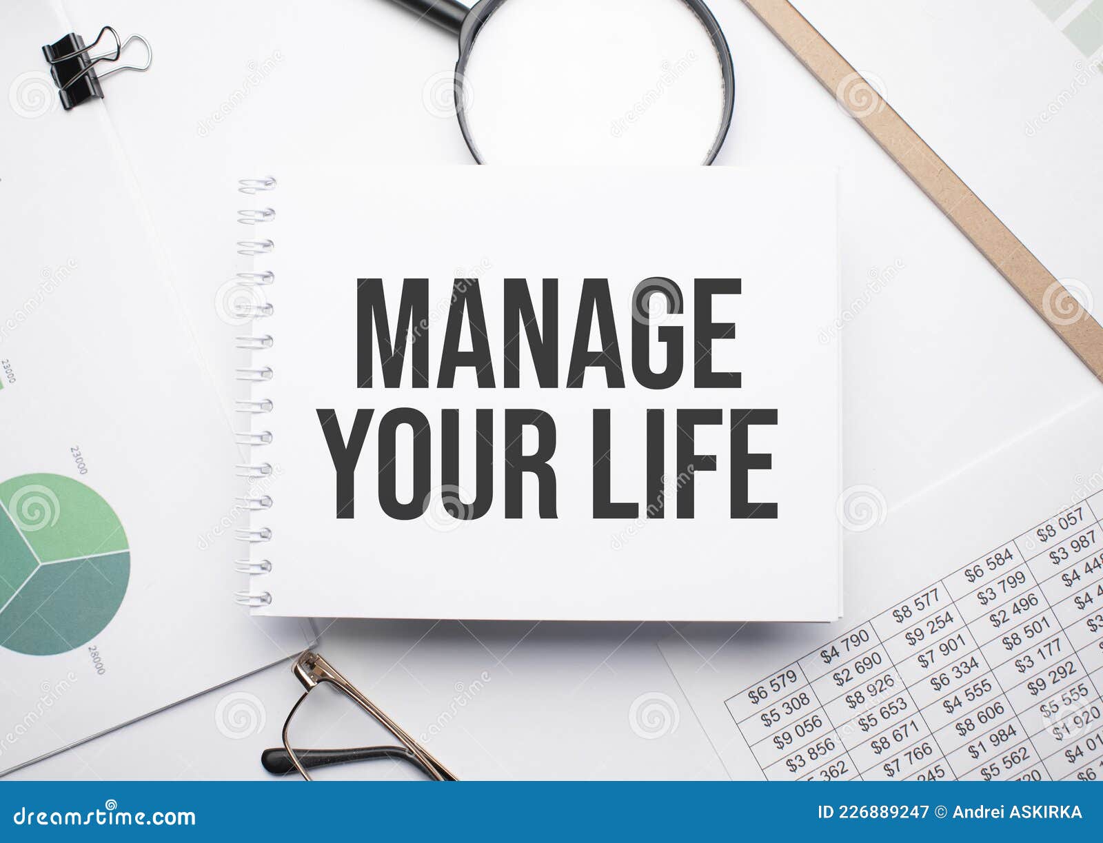 On the Notepad for Writing the Text Manage Your Life, Magnifier,charts ...