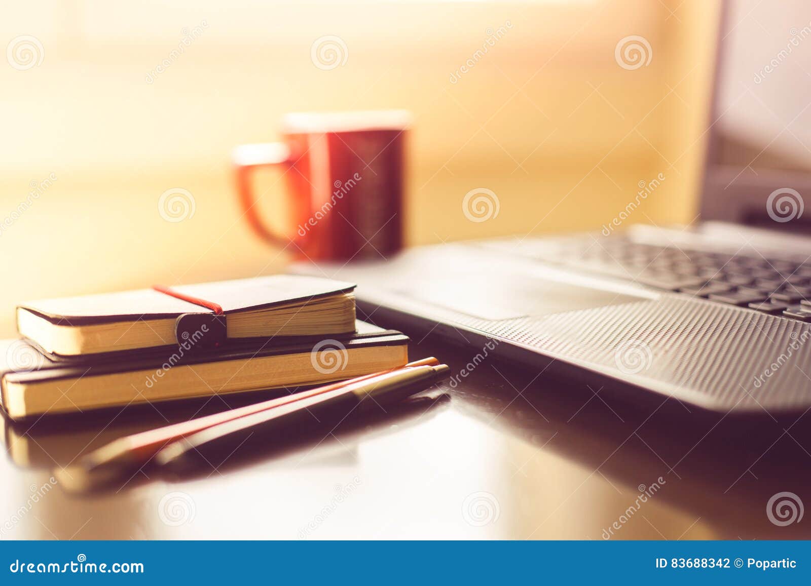 Notepads and Pens with Cup of Coffee and Laptop Stock Photo - Image of ...