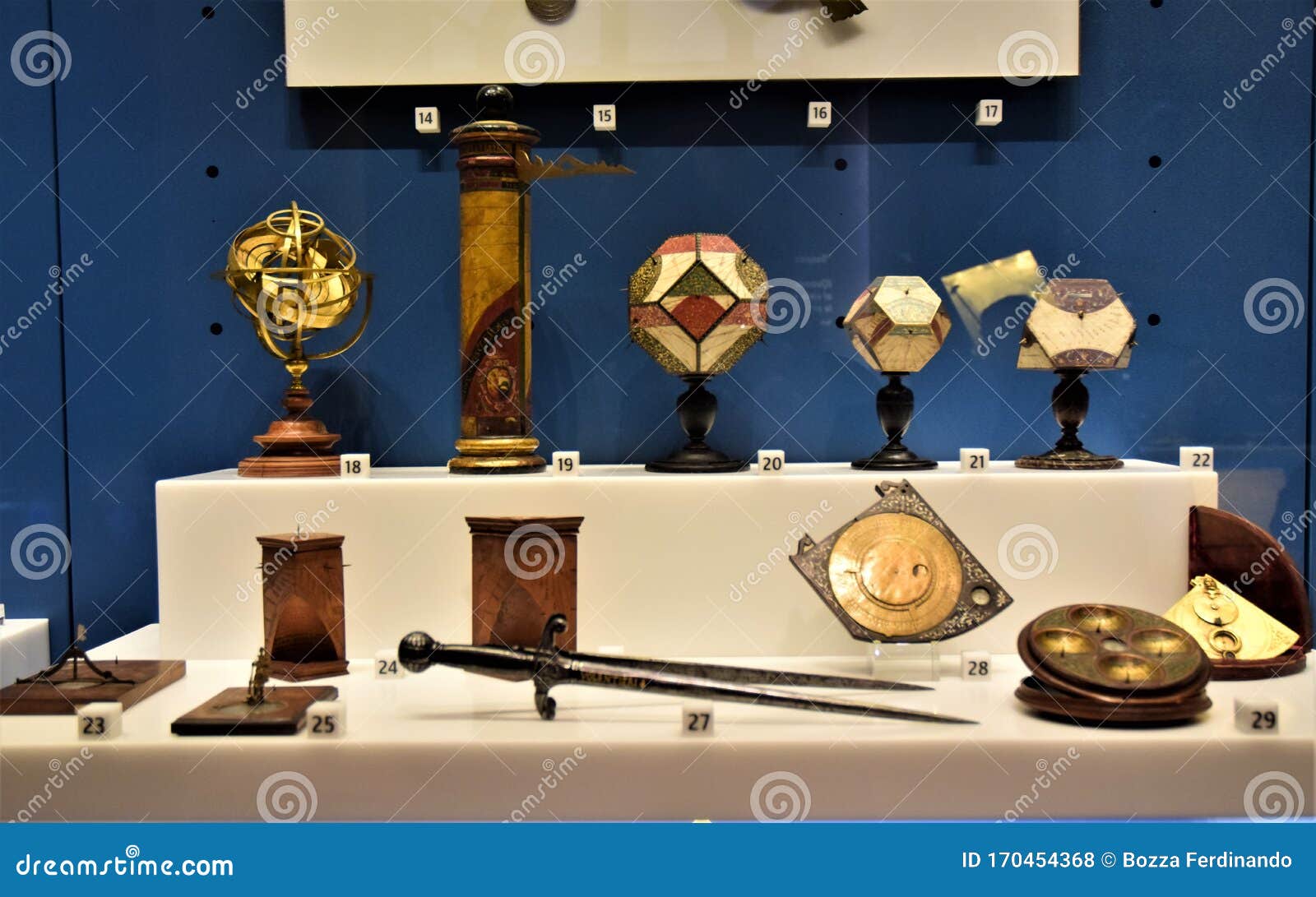 Notice Board Containing Various Ancient Tools and Objects, Including a ...
