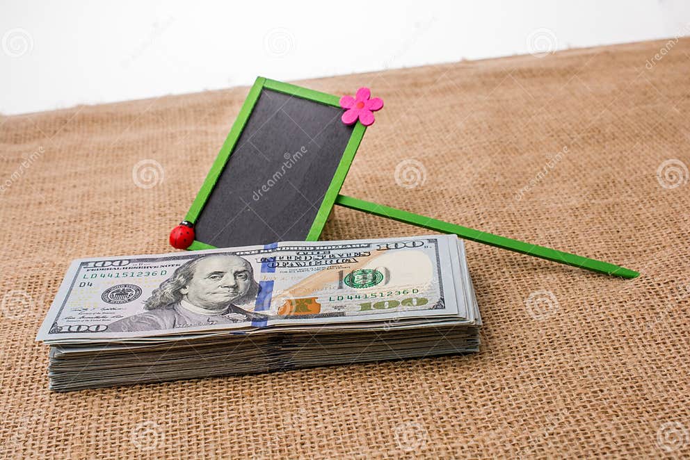 Notice Board Placed on the US Dollar Banknote Stock Image - Image of ...