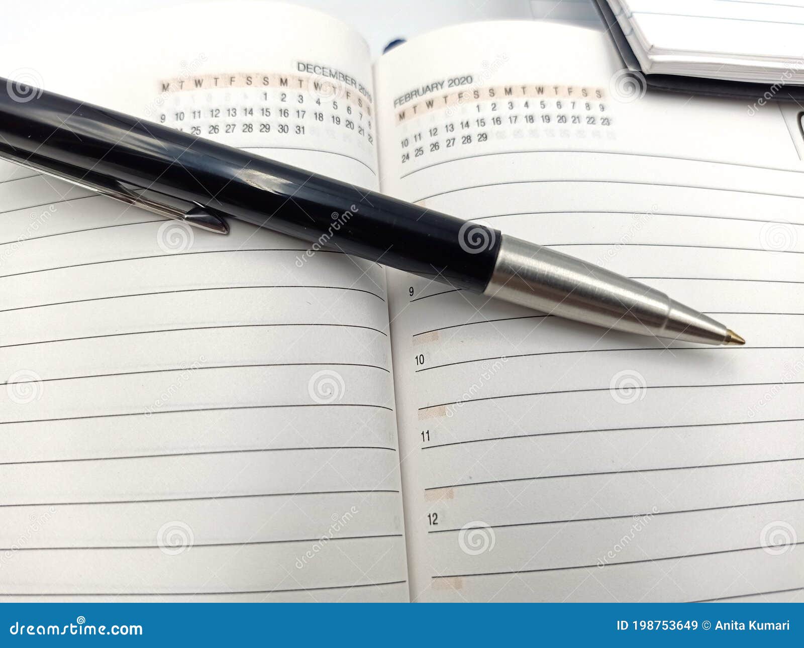 Notice Diary with the Pen on the Isolated White Background Stock Image ...