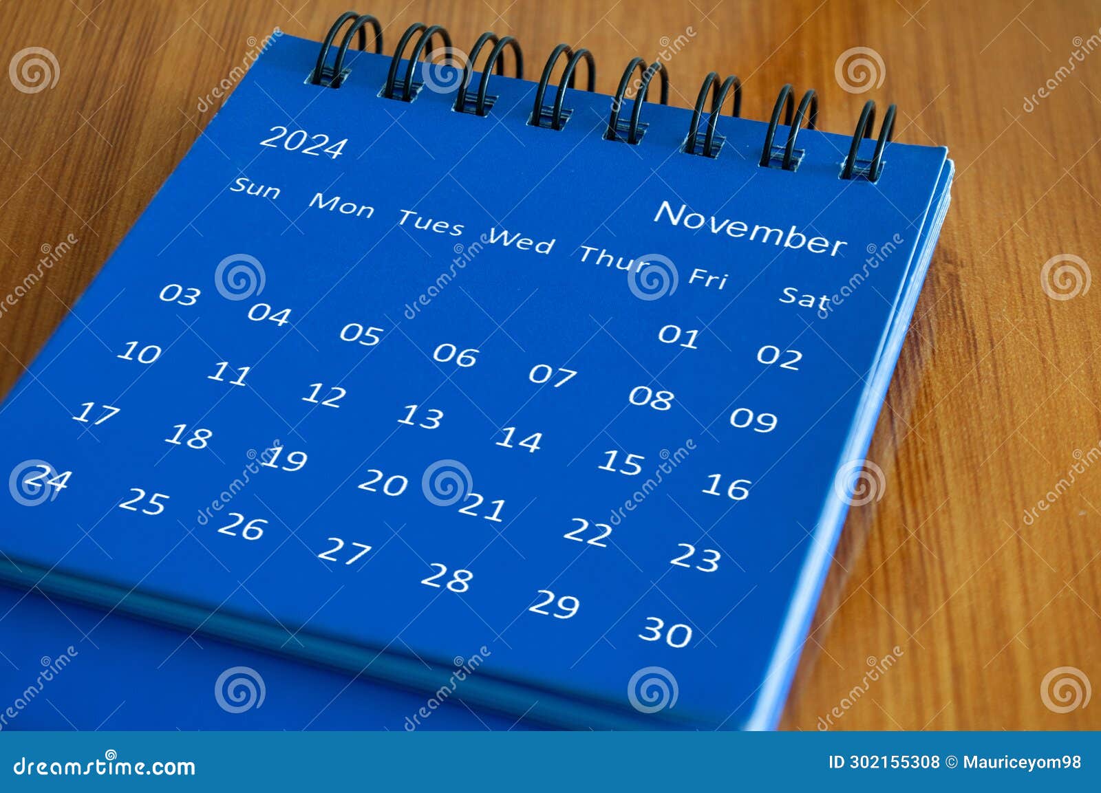 November 2024 Table Calendar on Wooden Desk. Time and Calendar Concept ...