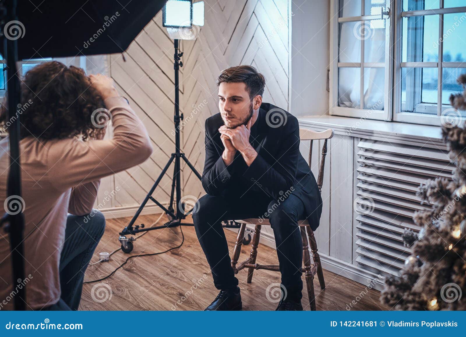 Novice Photographer at a Photo Shoot in a Studio with an Elegantly ...