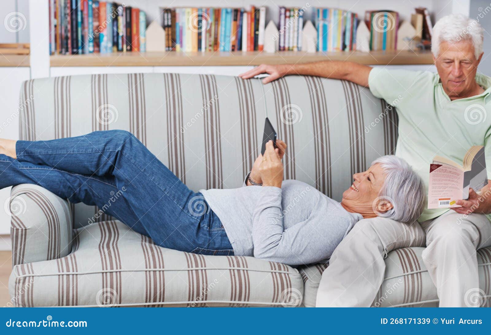 Now we Can Read the Same Book Together. a Senior Man Reading a Book ...
