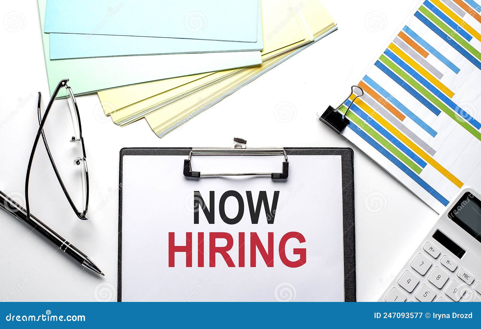 NOW HIRING Text on Paper Sheet with Chart,color Paper and Calculator ...