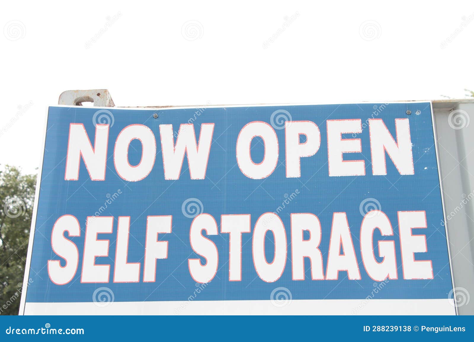 Now Open Self Storage Sign in White Writing Caption Text Against Blue ...