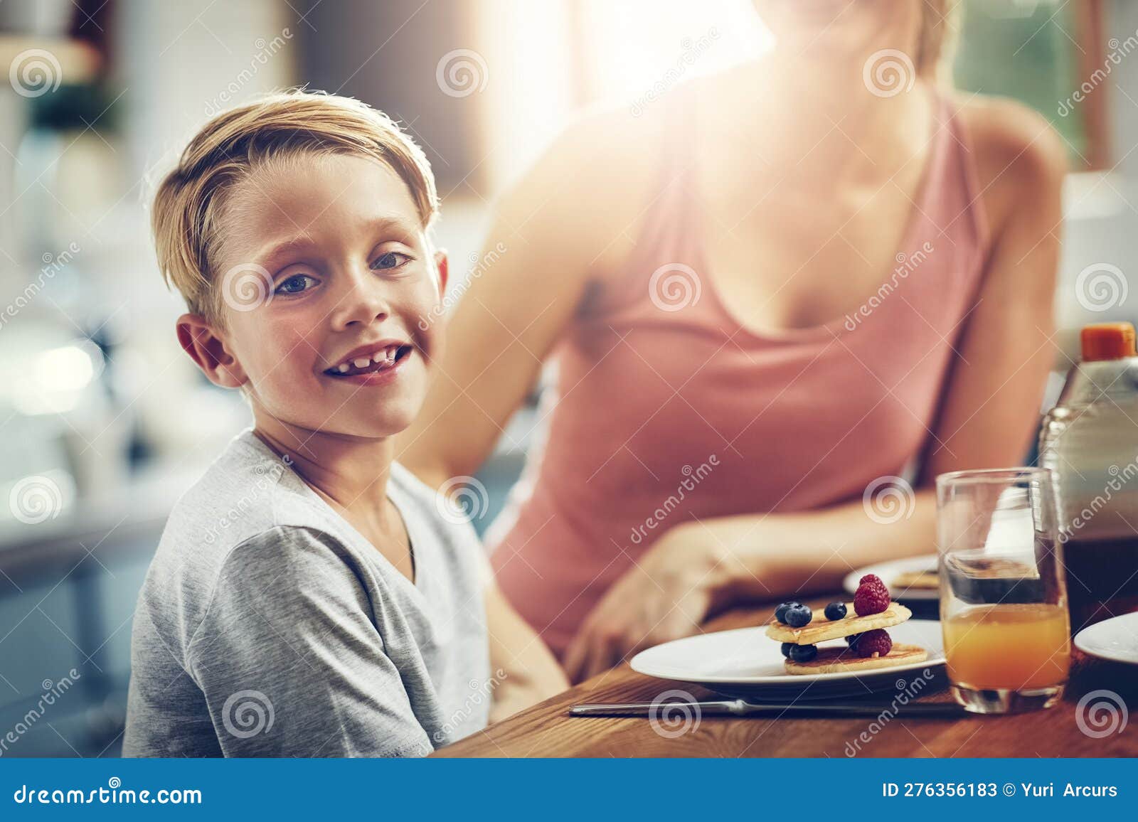 Now Thats His Kinda Breakfast. a Little Boy Having Breakfast at Home ...