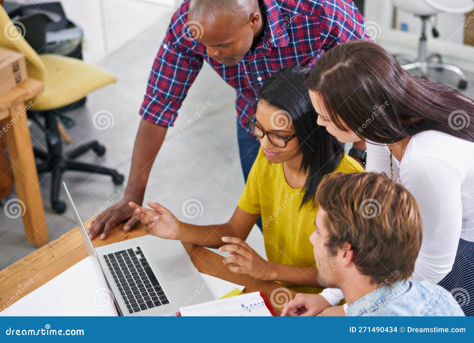 Now Thats Teamwork. a Young Designers at Work in an Office. Stock Photo ...