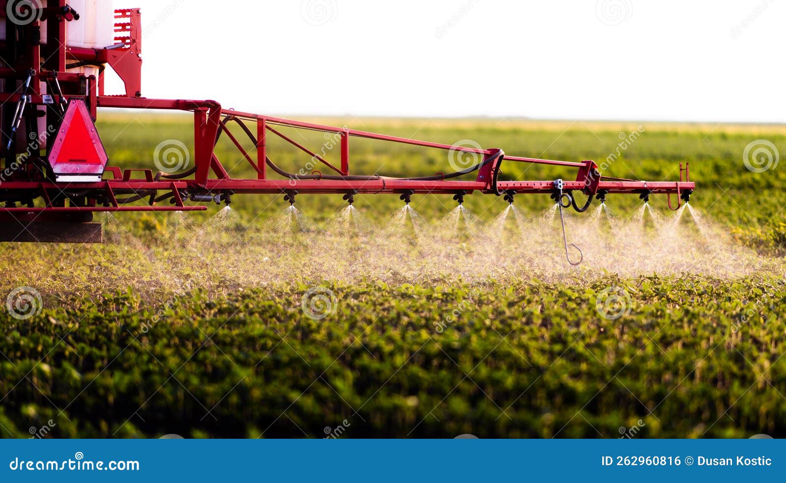 Nozzle Of The Tractor Sprinklers Stock Photo | CartoonDealer.com #248788020