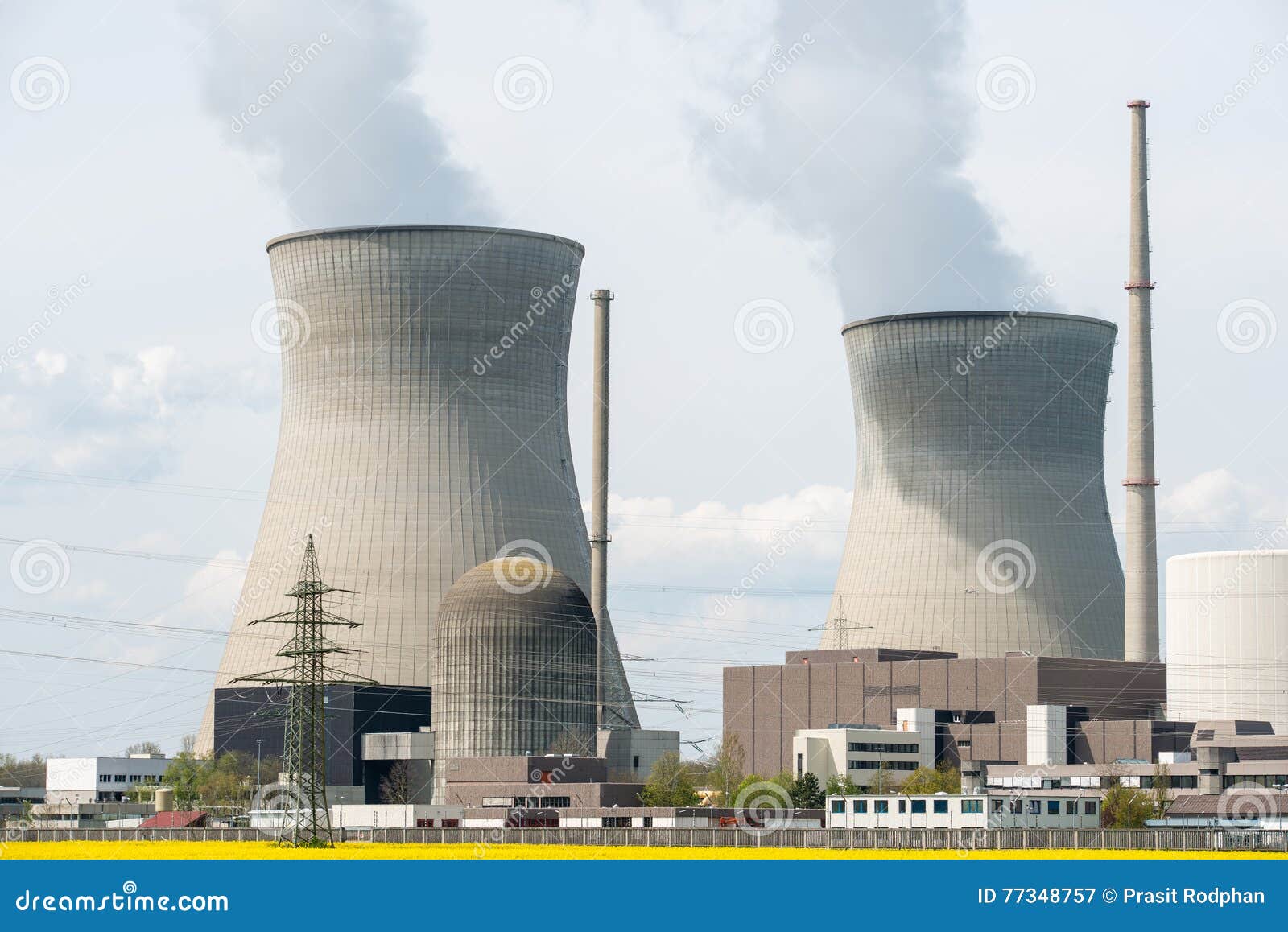 Nuclear Power Plant with Yellow Field and Big Blue Clouds Stock Image ...