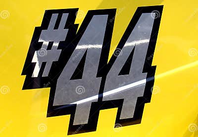 Number 44 on Side of Racing Car Stock Photo - Image of shiny, yellow ...