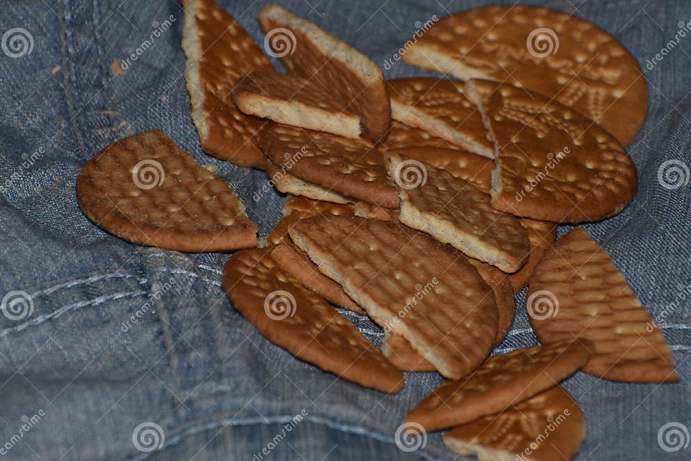 Number of Biscuits Broken into Two Halves, with the Background of Blue ...