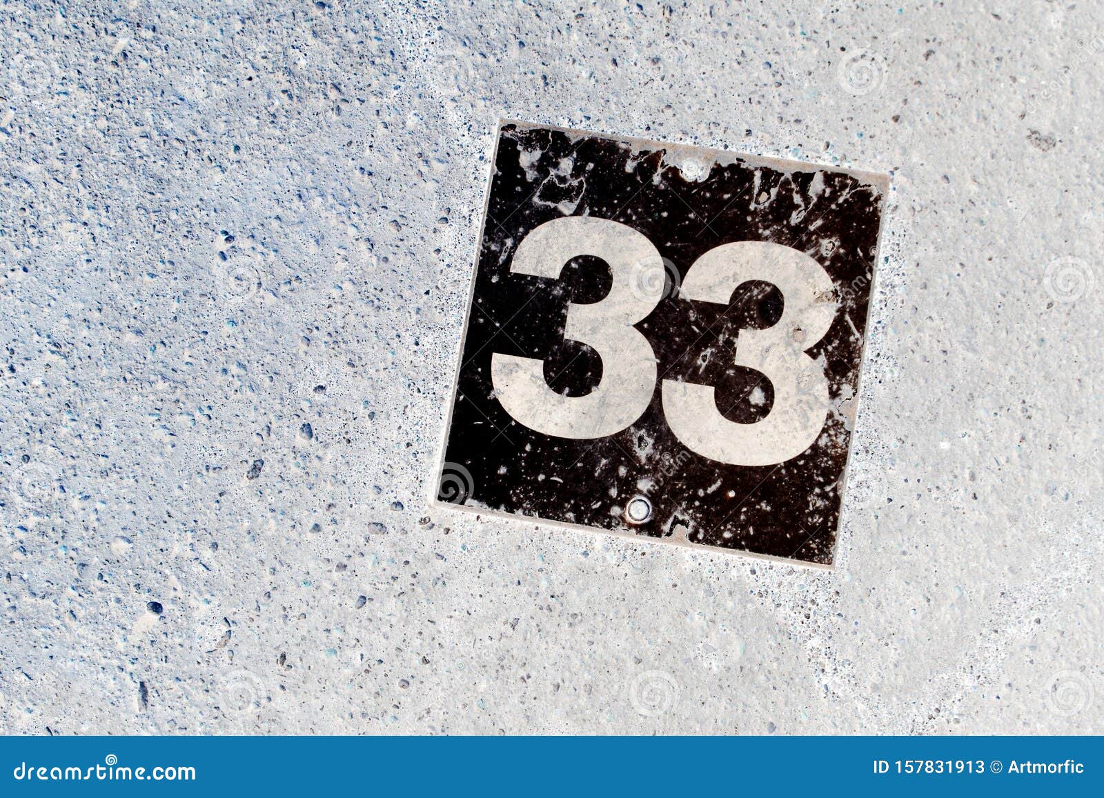 Number 33 Black Plate on White Wall Background Stock Image - Image of ...