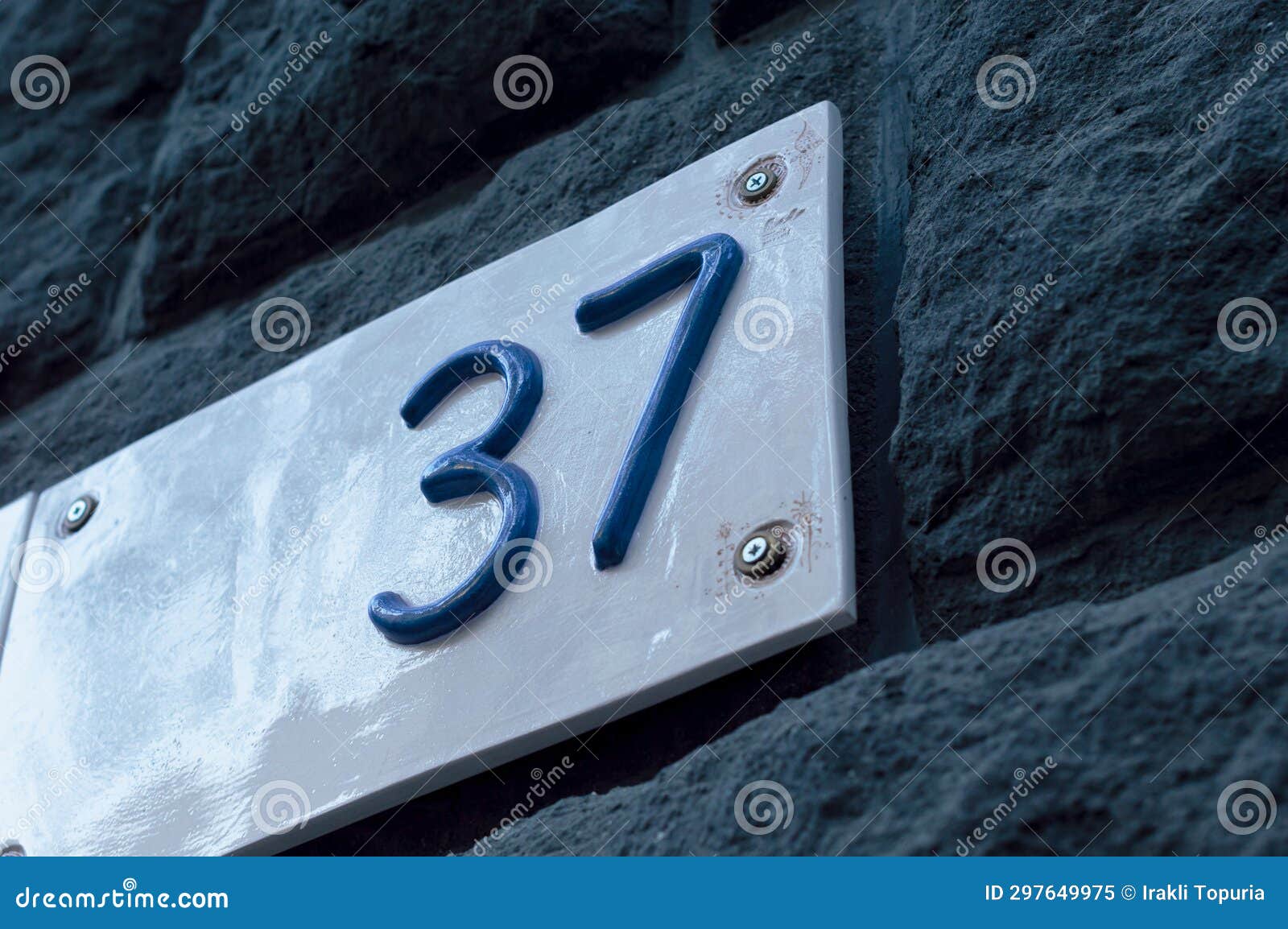 Number 37 Building White Ceramic Number Plate with Blue Numbers, on the ...
