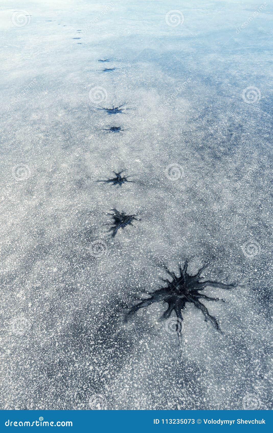 A Number of Burrows Hole in the Ice Stock Image - Image of skating ...