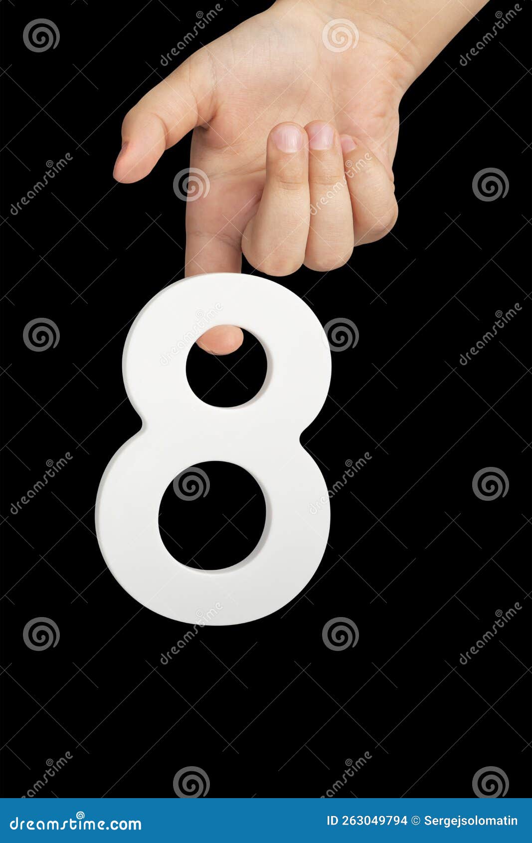 Number Eight in Hand Isolated on Black Background. Number 8 in a Child ...