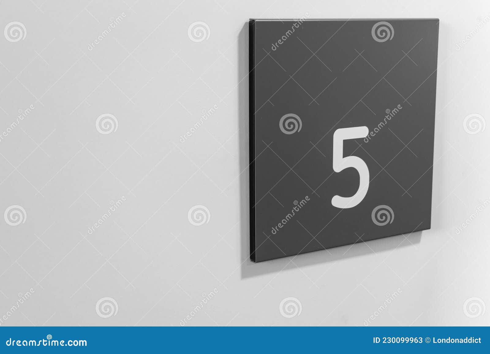 Number Five 5 Sign on Blacn Plastic on White Wall Stock Image - Image ...