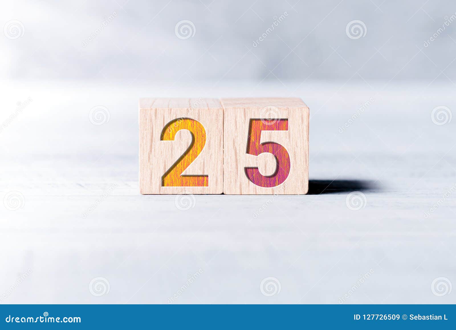 Number 25 Formed by Wooden Blocks on a White Table Stock Image - Image ...